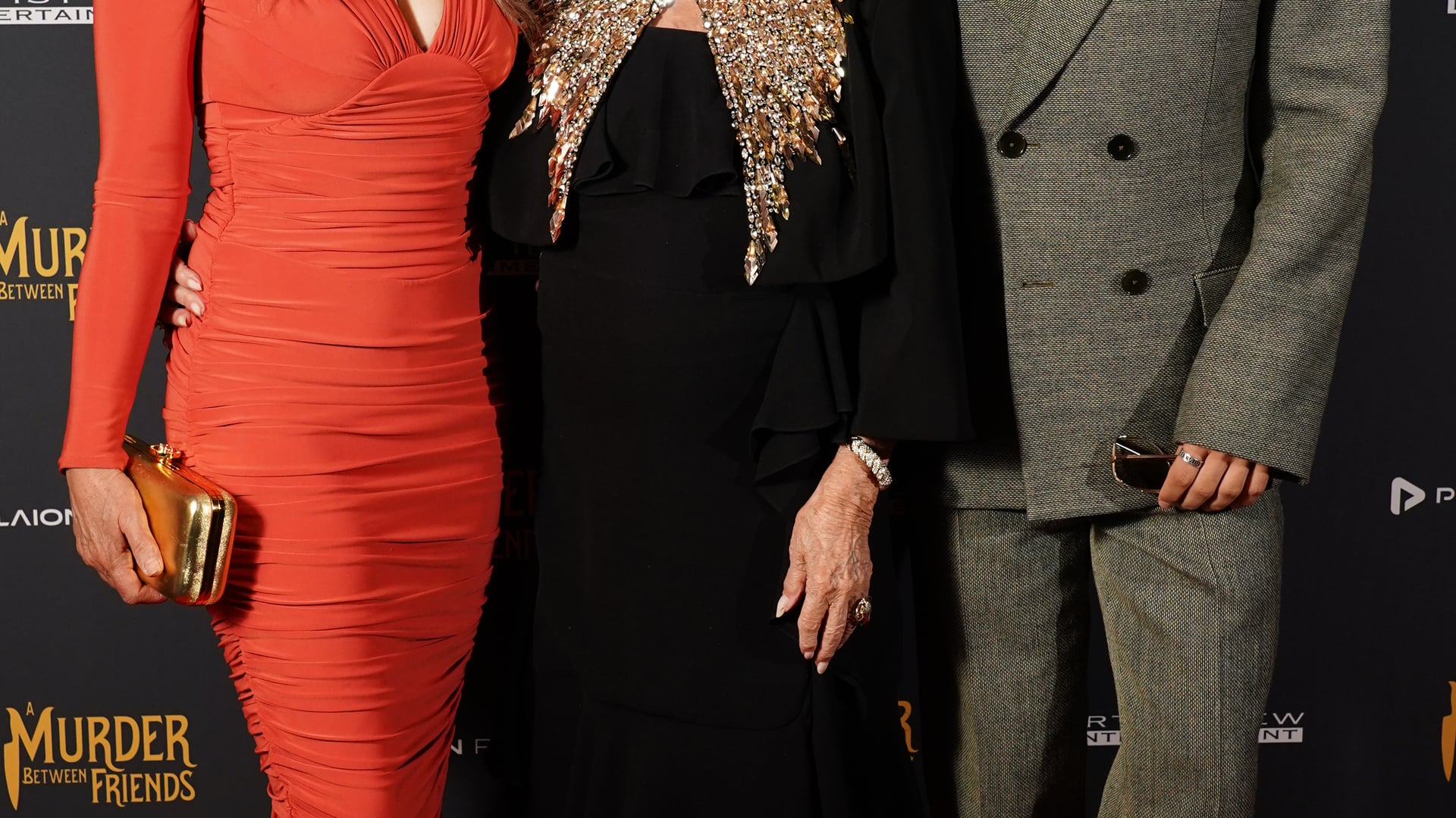 Dame Joan Collins reunites with Elizabeth Hurley on red carpet ...