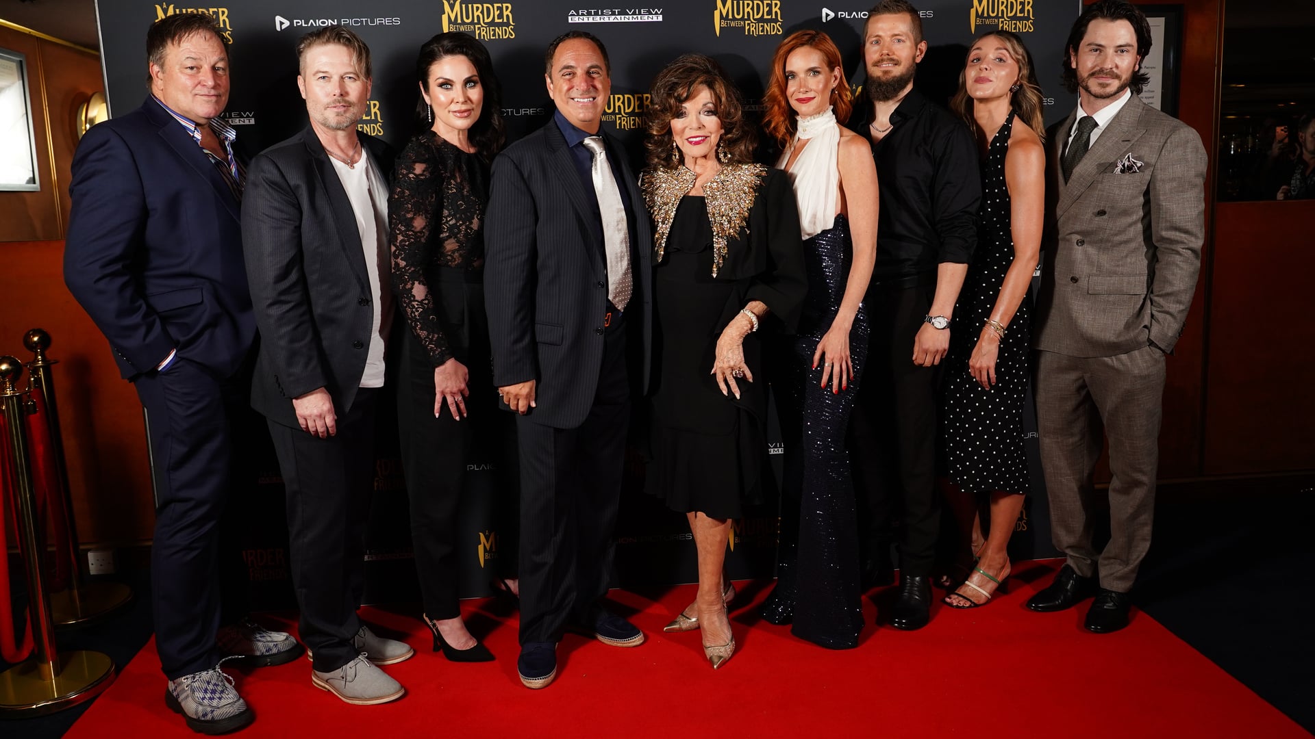 Dame Joan Collins reunites with Elizabeth Hurley on red carpet ...
