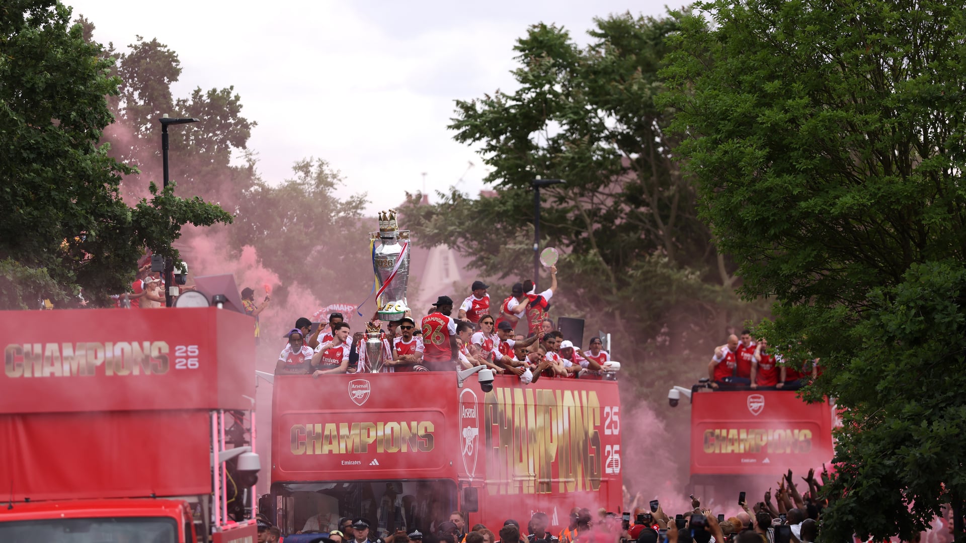 Stacey Solomon and Joe Swash celebrate Arsenal title win at bus parade ...