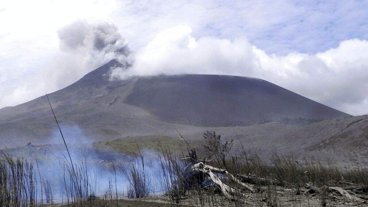 Indonesian volcano erupts sending thick ash into sky | Belfast Telegraph