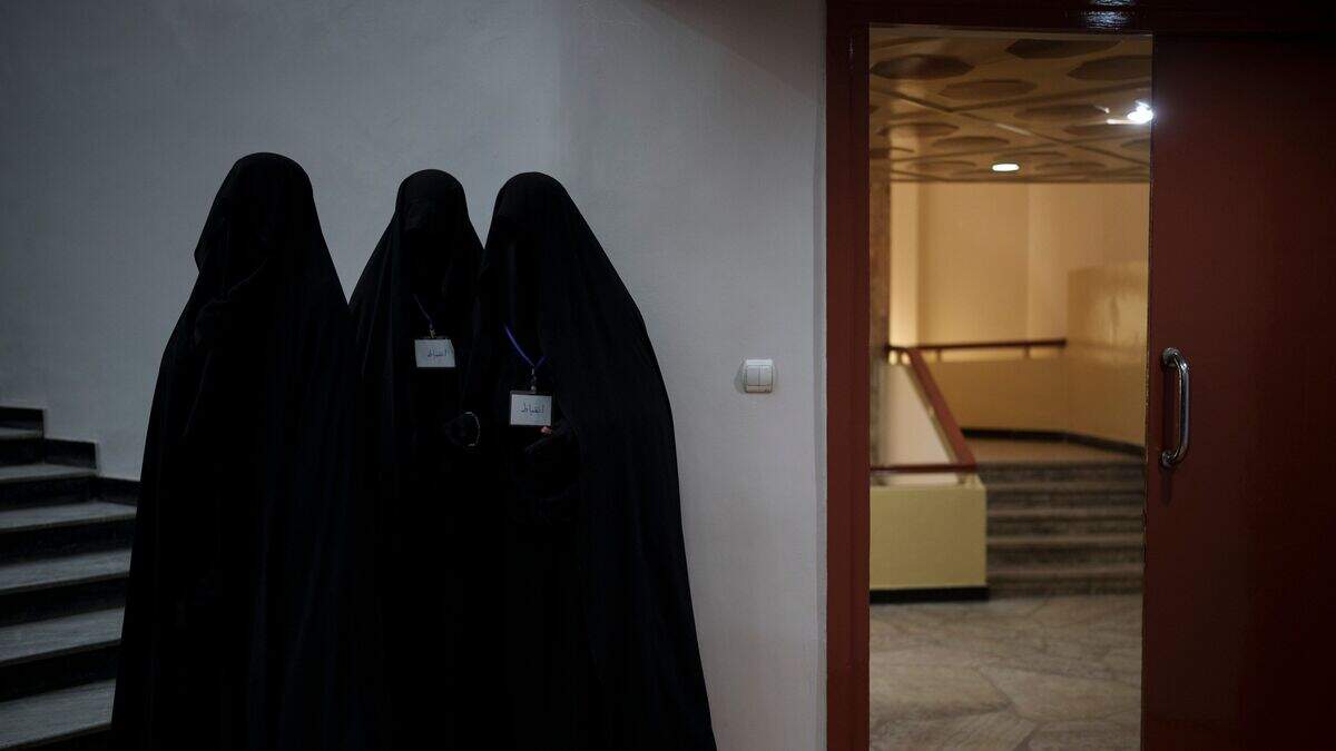 Afghan women can study but must wear Islamic dress in gender-segregated ...