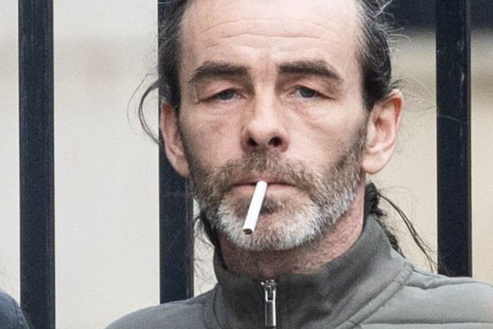 Anti-migrant protest chief Steven Baker charged over Belfast riot ...