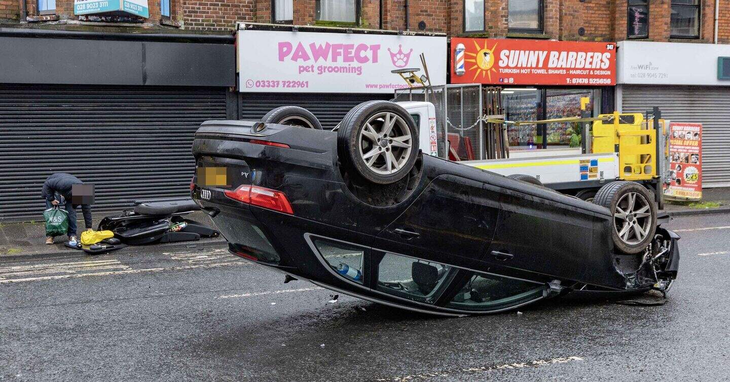 Woodstock Road: Firefighters free trapped woman as car overturns in ...