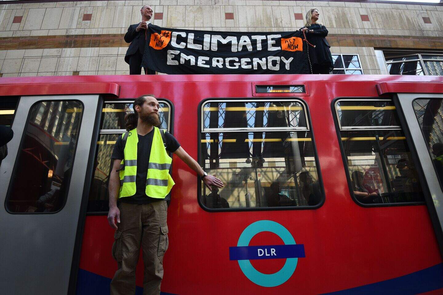 Jury convicts environment protesters ‘with regret’ over Canary Wharf ...