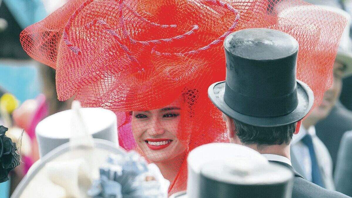 Hats off to the lady in red at Royal Ascot | Belfast Telegraph