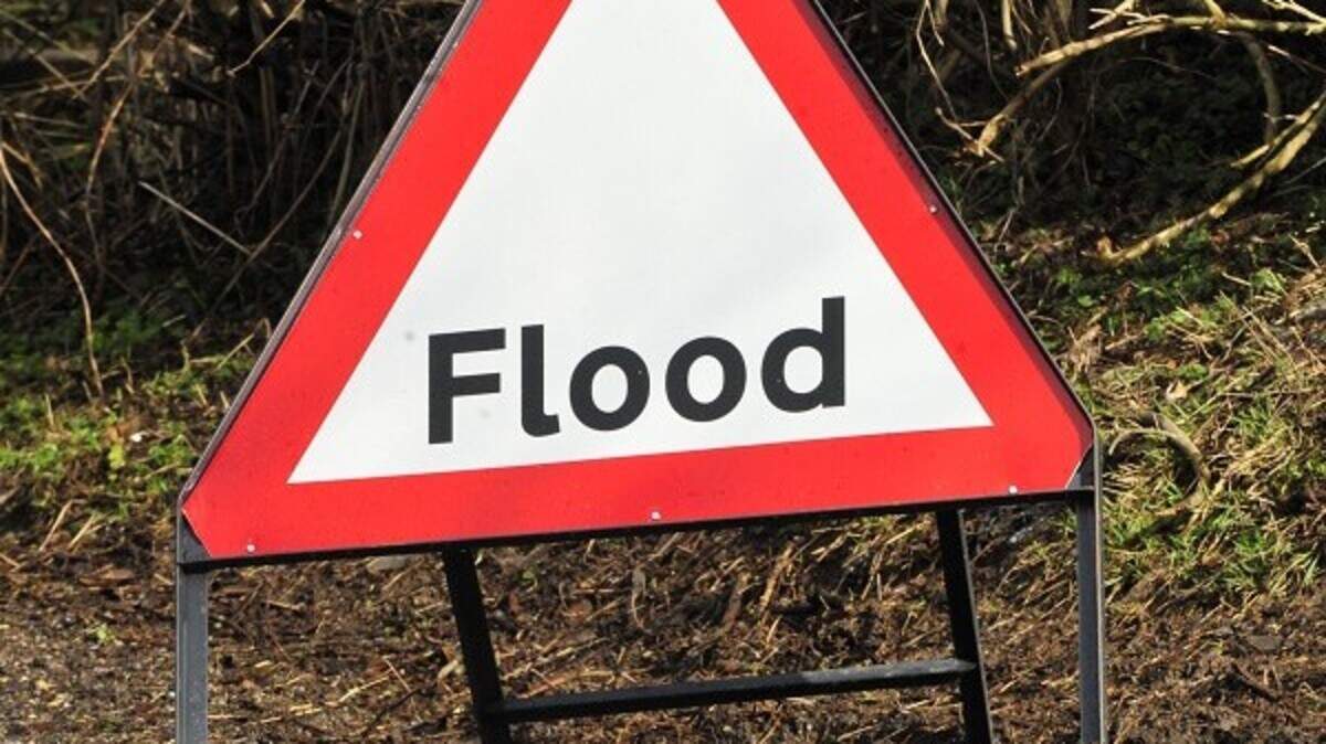 City street hit by flash flooding | Belfast Telegraph
