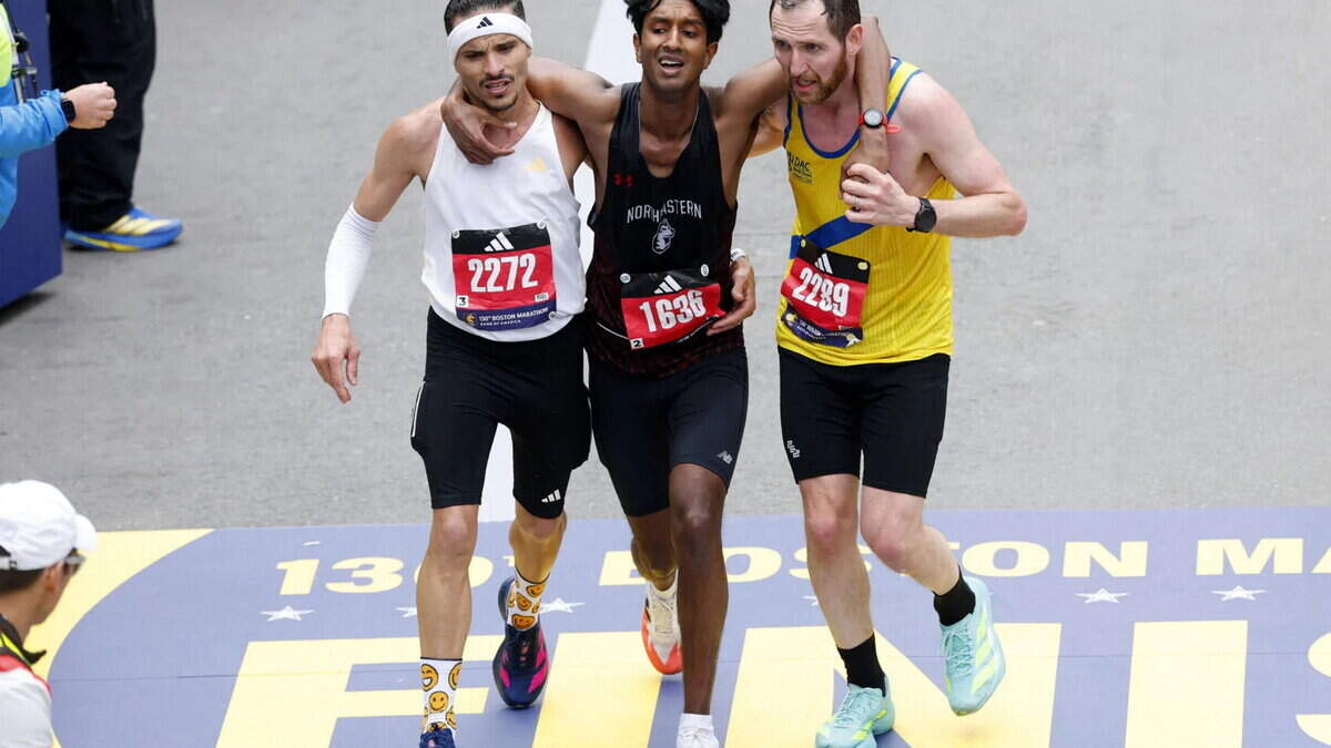 Boston Marathon: Praise for NI athlete Aaron Beggs who helped stricken ...