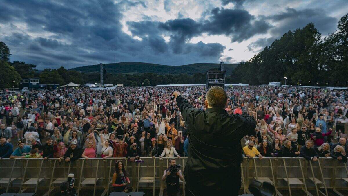 Festival fun: Féile an Phobail kicks off as 10,000 revellers pack Falls ...