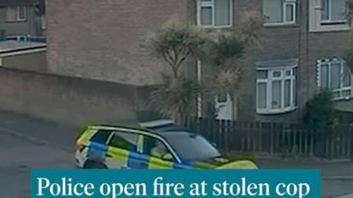 Police open fire at stolen cop car after it runs officer over in ...