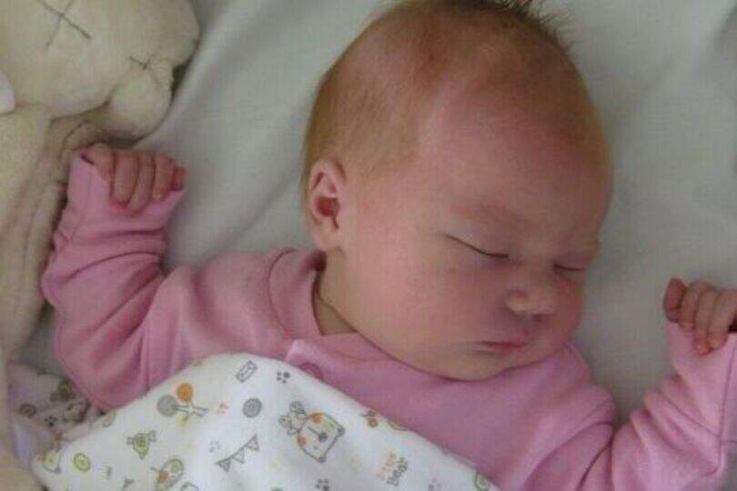Just Born: Little Harrison Robert Wells' quivering lip captured ...