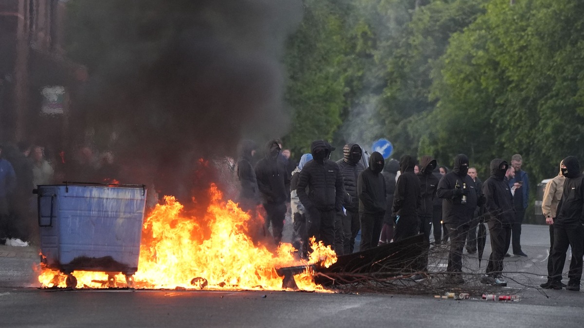 Arrest after two police officers ‘savagely targeted’ with petrol bomb ...