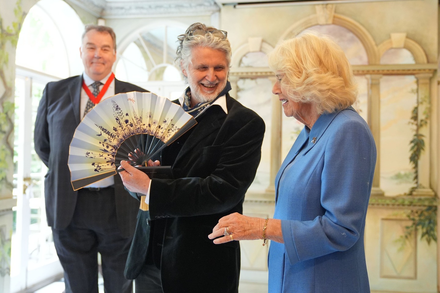 Camilla given fan from coronation portrait on visit to museum’s new ...