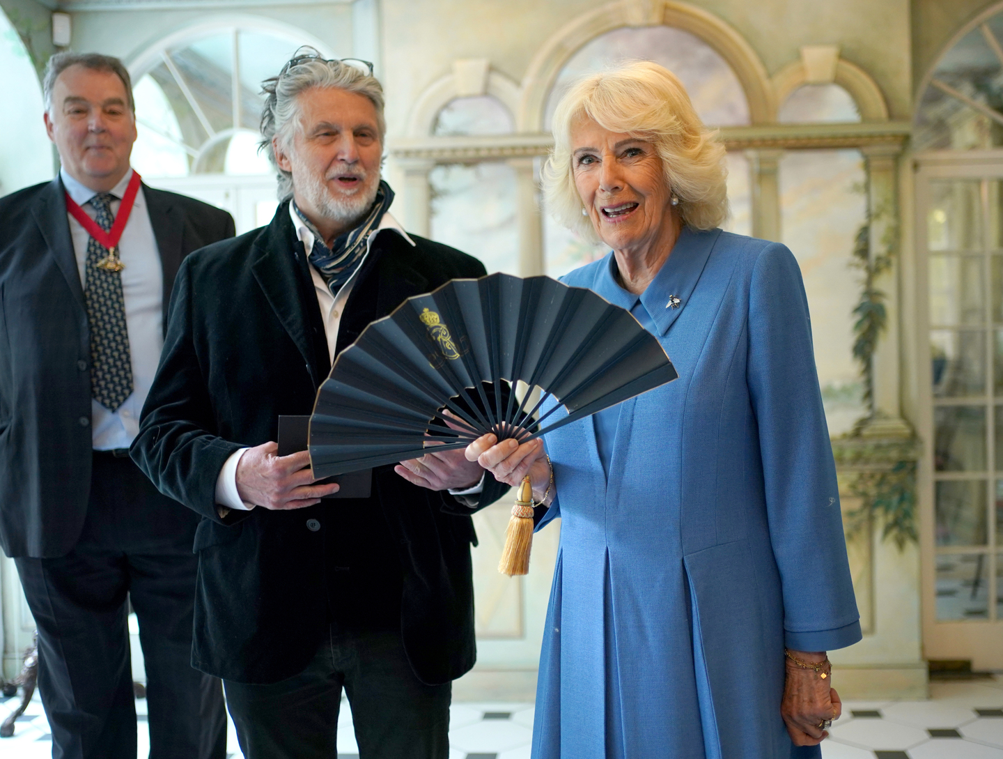 Camilla given fan from coronation portrait on visit to museum’s new ...