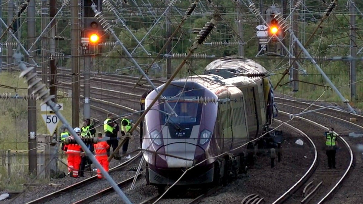Train driver killed and dozens injured as two trains collide near ...